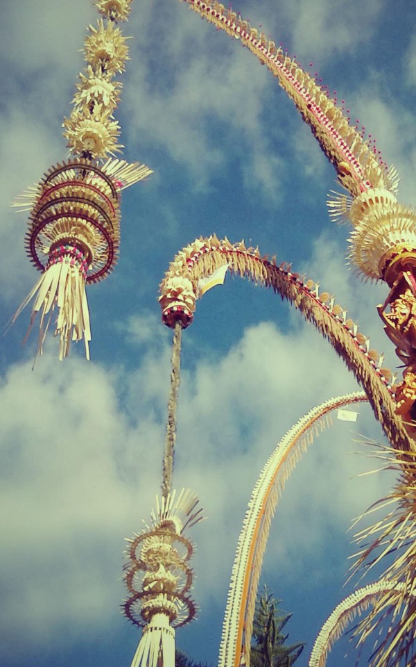 The tall decorated votive poles that hang over Balinese streets: the ...