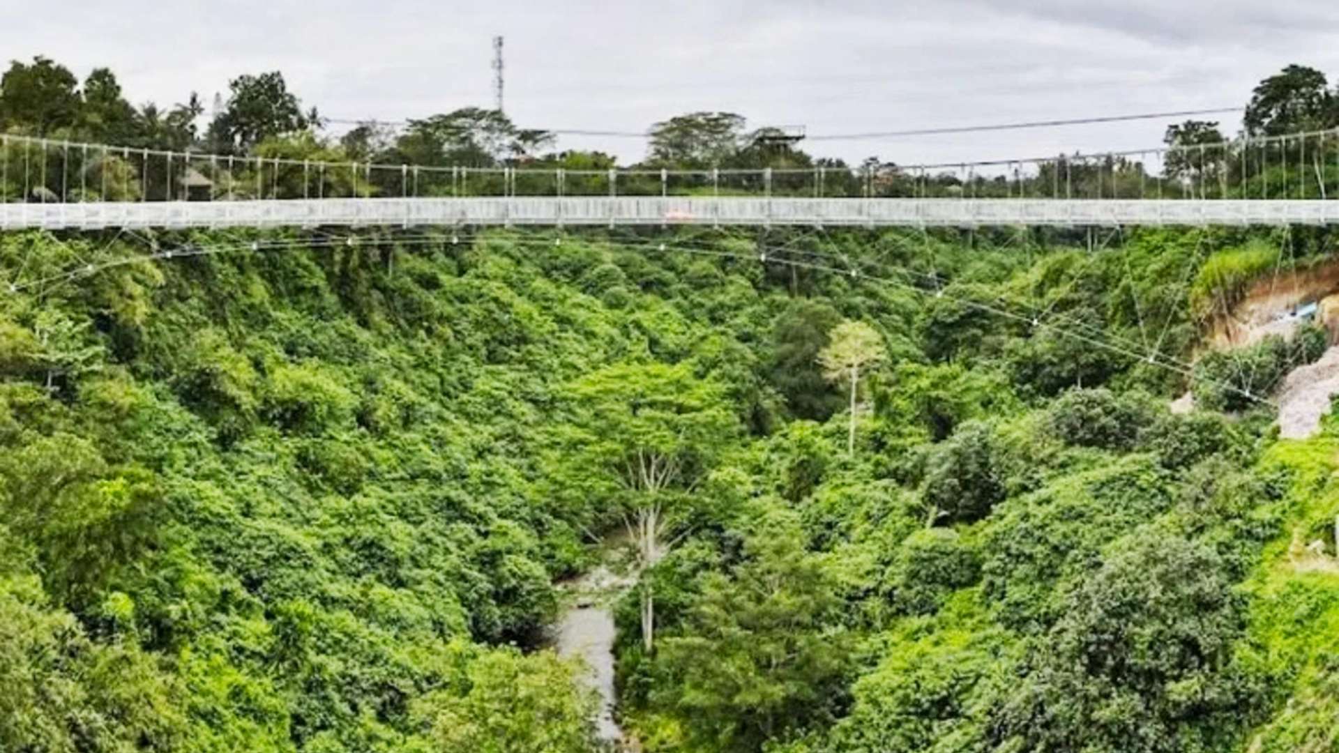The Thrilling River-Crossing Across a Glass Bridge | Bvlgari Resort Bali
